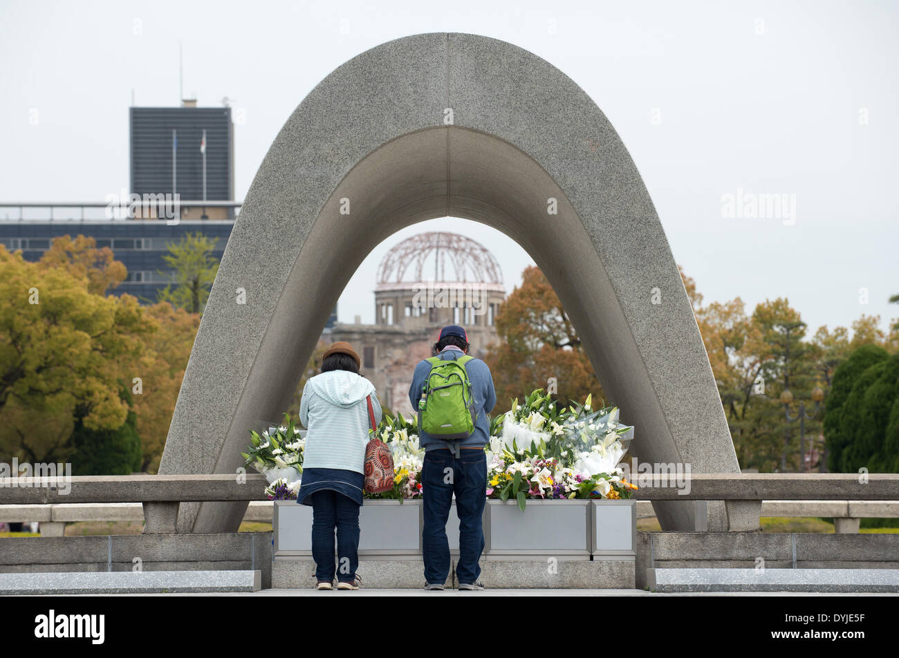 Hiroshima, Japan. 12th Apr, 2014. People stand in front of the cenotaph ...