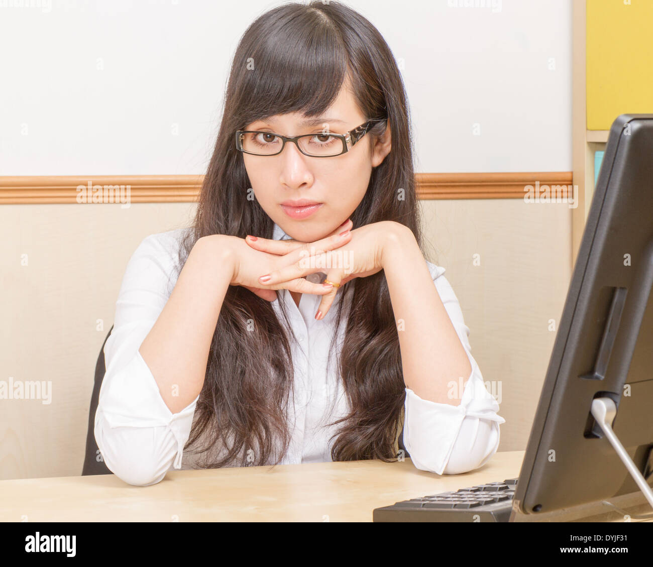Happy chinese businesswoman sitting desk hi-res stock photography and ...