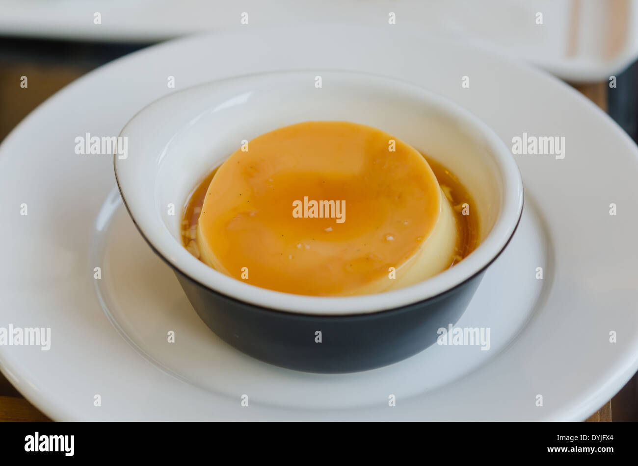 Creme caramel , Custard pudding flan in a bowl Stock Photo - Alamy
