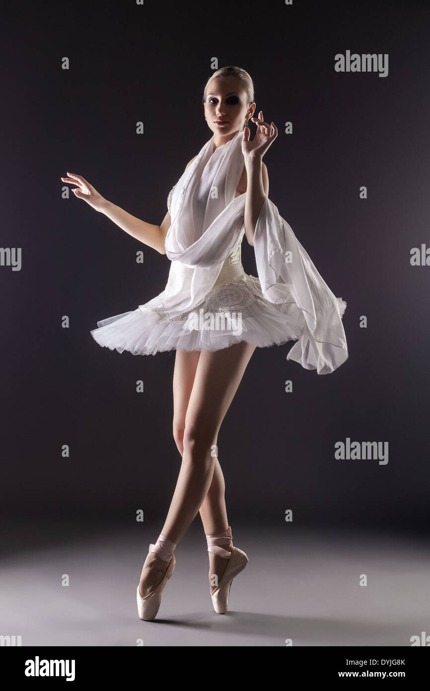 Adorable contemporary ballerina dancing in studio Stock Photo - Alamy