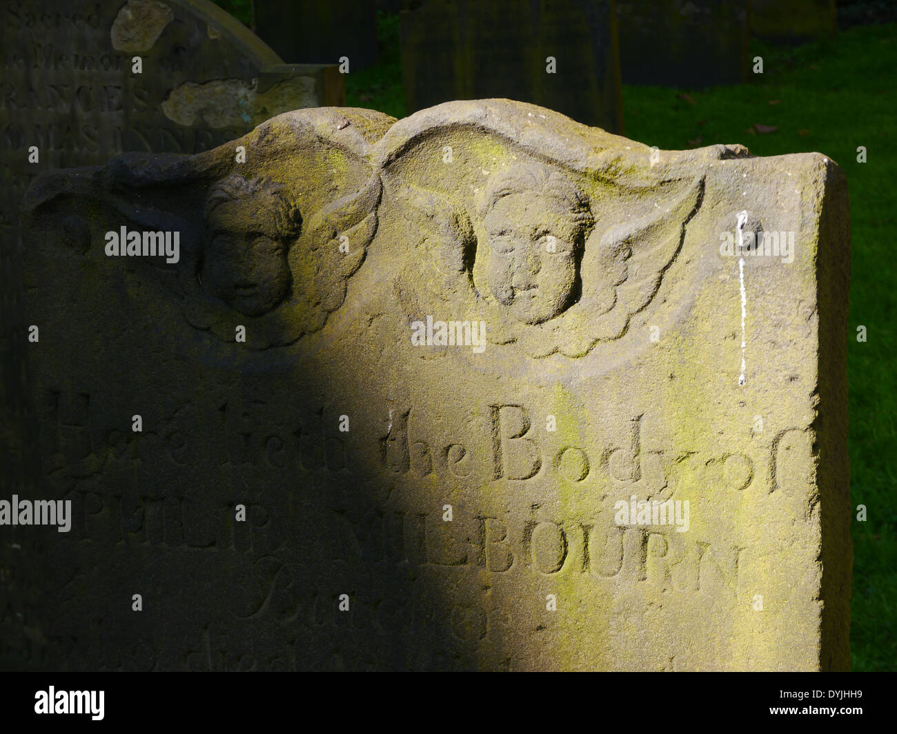 Historic grave stone in burial ground / cemetery at Church of St ...