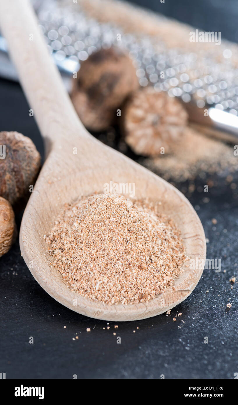 Wooden spoon with Nutmeg Powder (close-up shot Stock Photo - Alamy