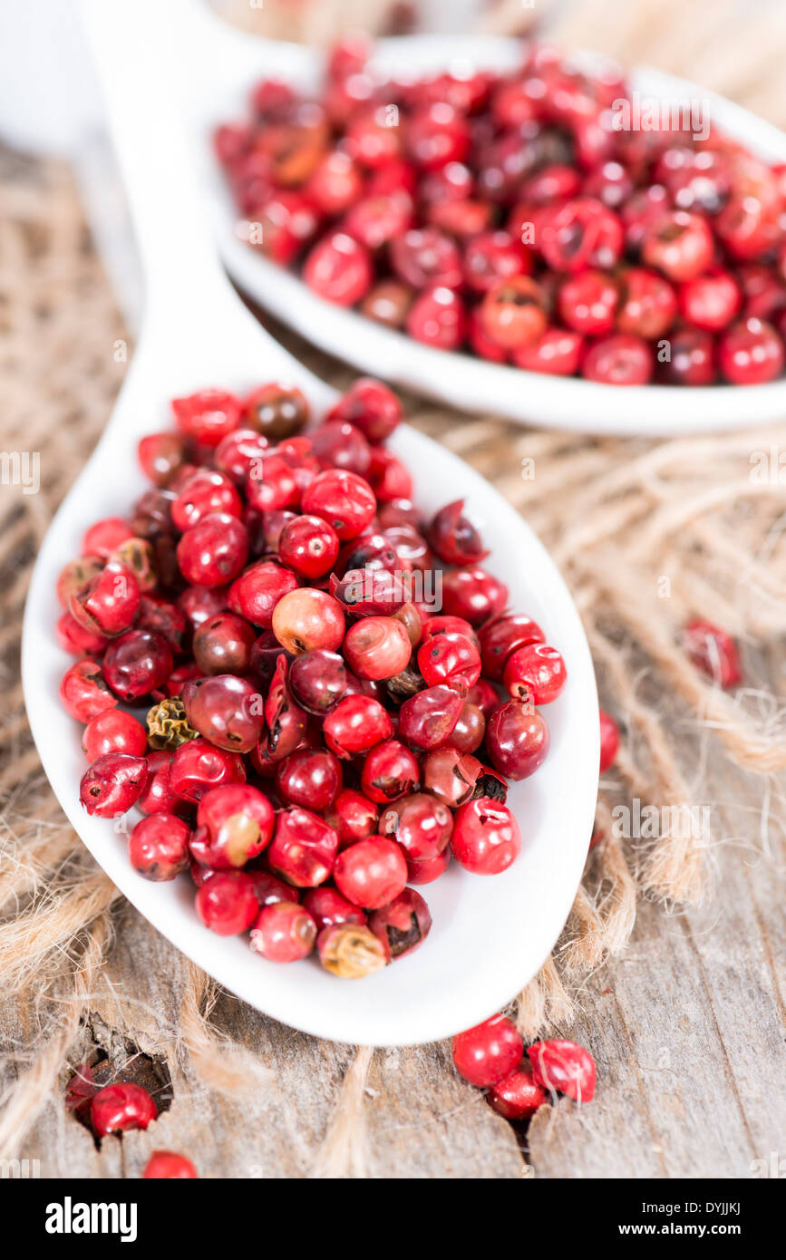 Portion of dried Pink Peppercorns (detailed close-up shot Stock Photo ...