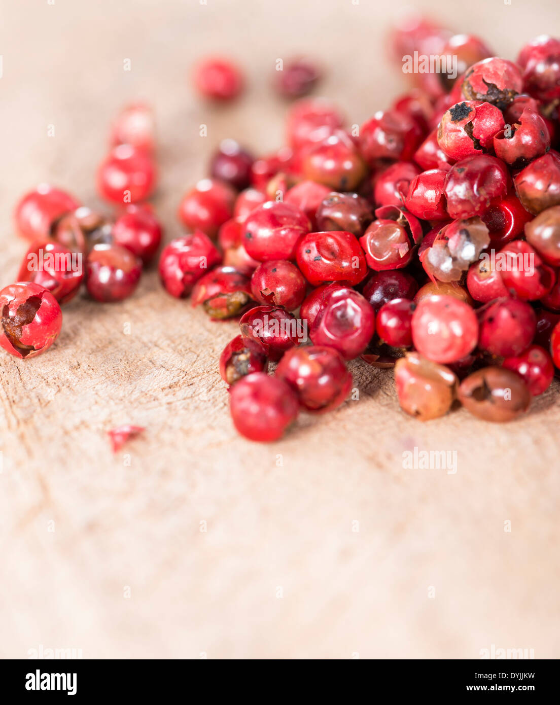 Portion of dried Pink Peppercorns (detailed close-up shot Stock Photo ...