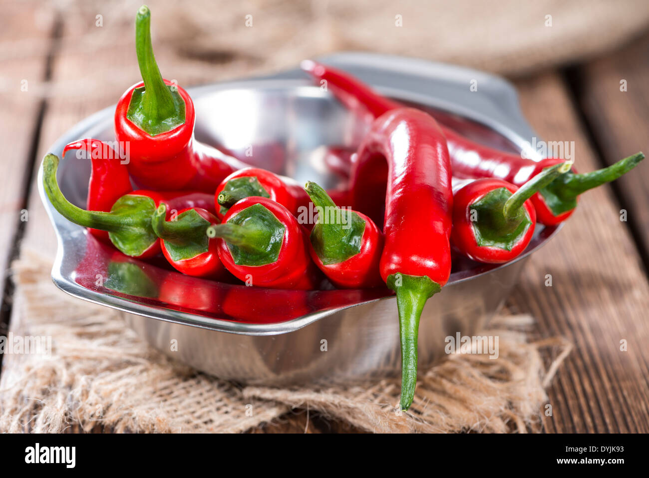 Raw red chillies hi-res stock photography and images - Alamy