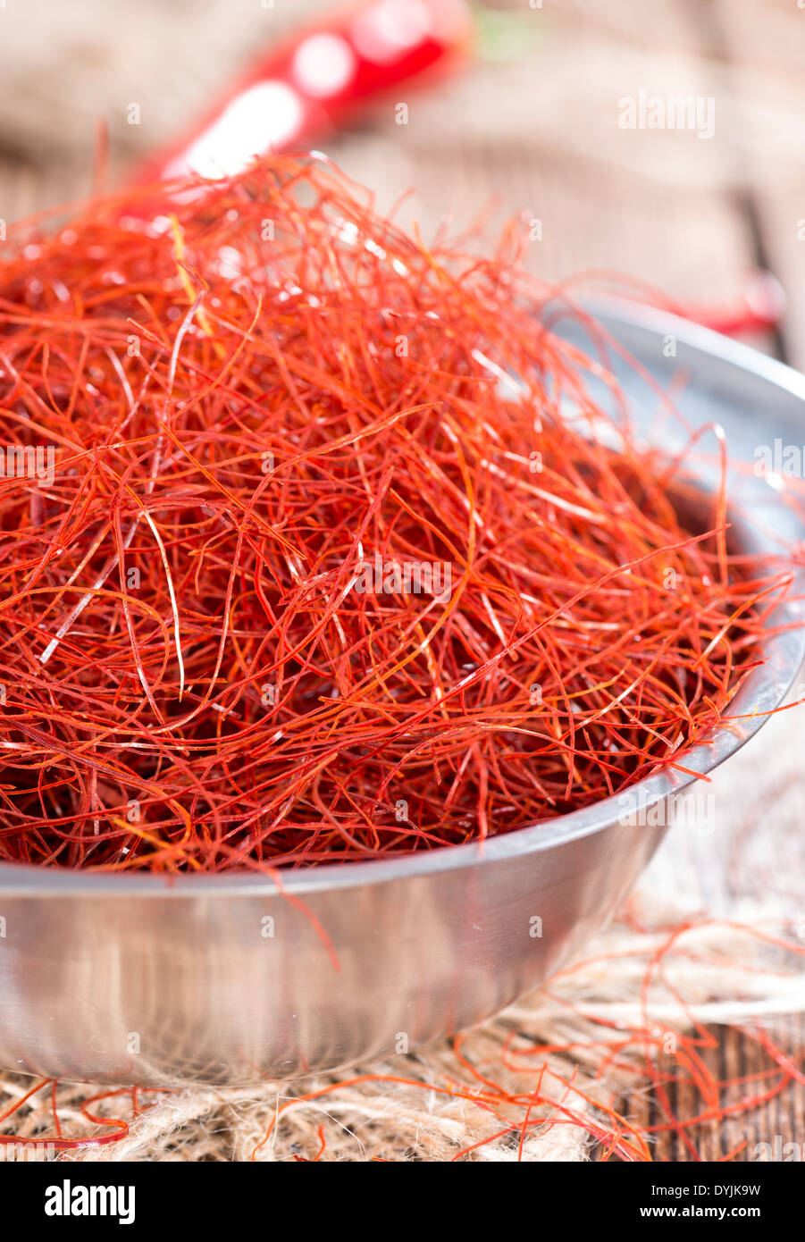 Hot red Chilli Strings on vintage wooden background Stock Photo - Alamy
