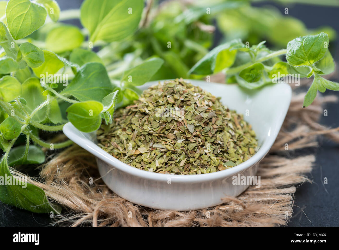 Portion of shredded Oregano (detailed close-up shot Stock Photo - Alamy