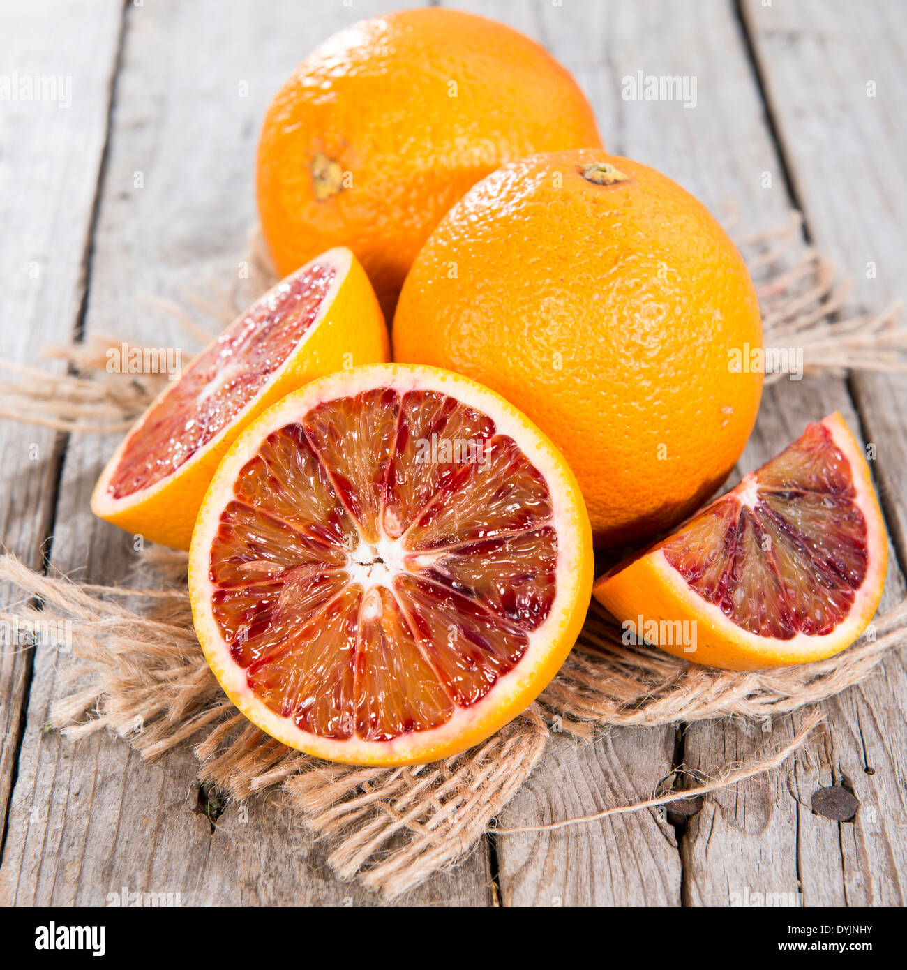 Fresh Blood Oranges on wooden background Stock Photo - Alamy