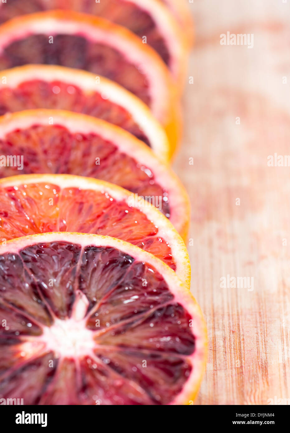 Fresh Blood Oranges on wooden background Stock Photo - Alamy