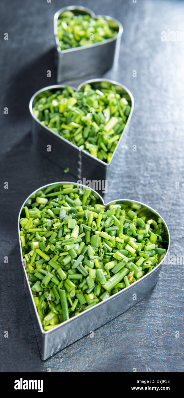 Heart shapes filled with fresh cutted Chive (I love herbs concept Stock ...