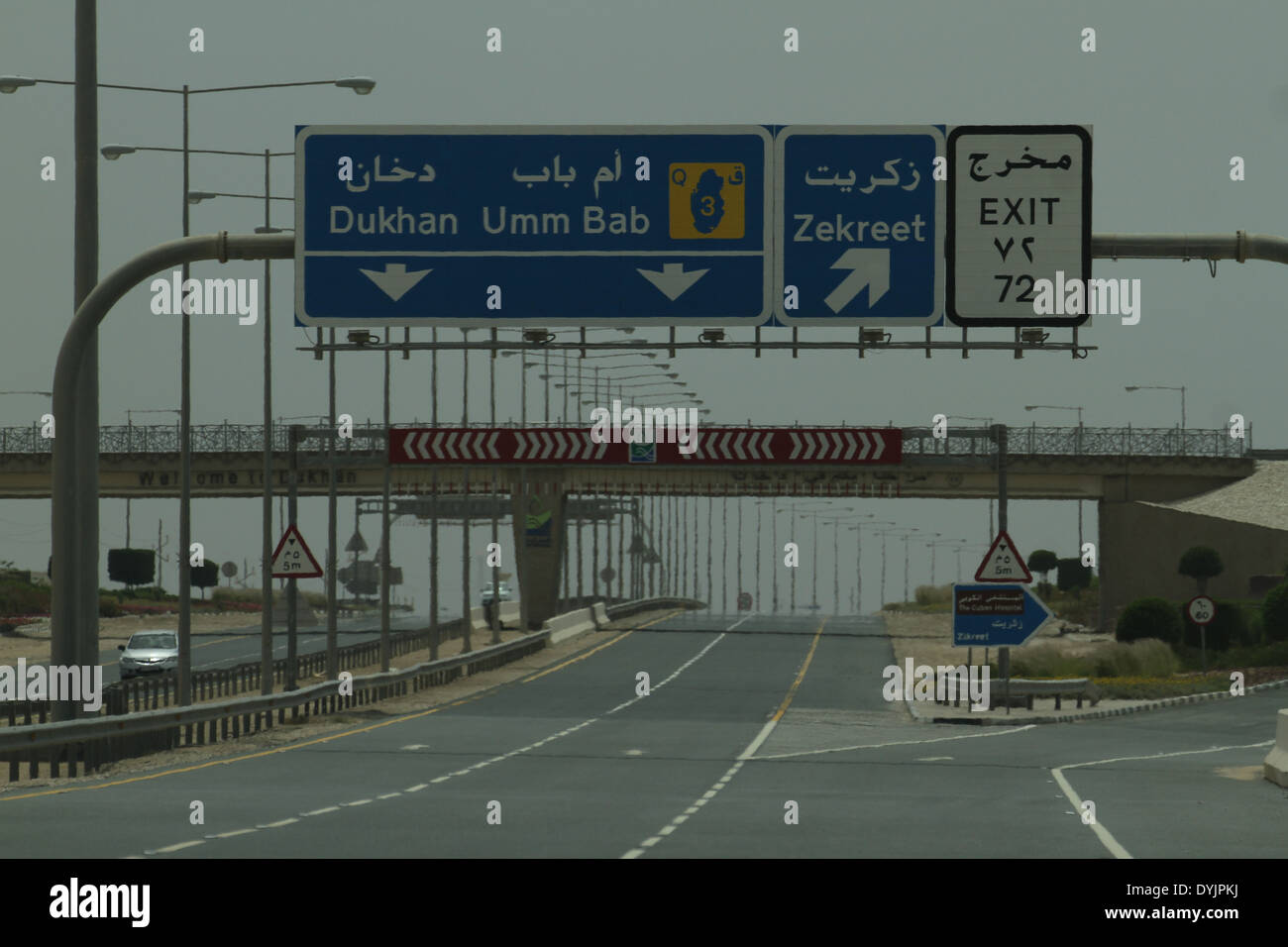 Dukhan, Qatar. April 18 2014. Road signs on the Doha to Dukhan highway ...