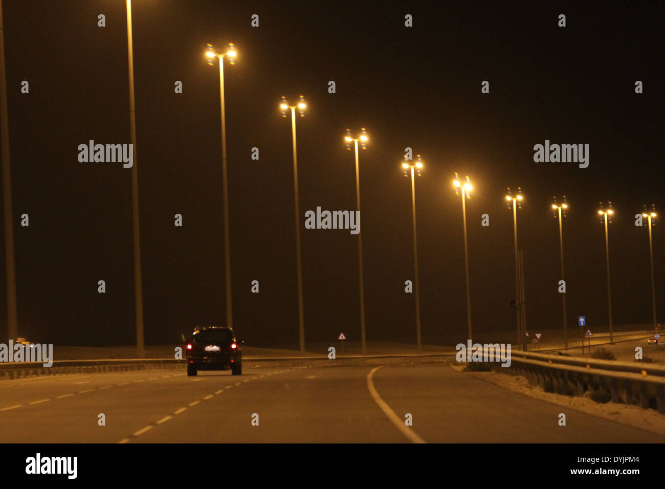 Dukhan, Qatar. April 18 2014. Road signs seen on the Dukhan to Doha ...