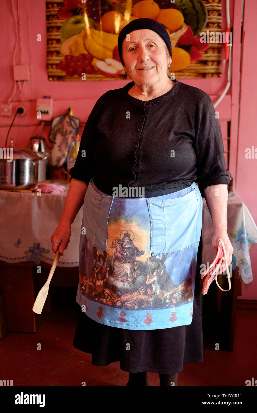An elderly Georgian woman in the village of Ushguli located at the head ...