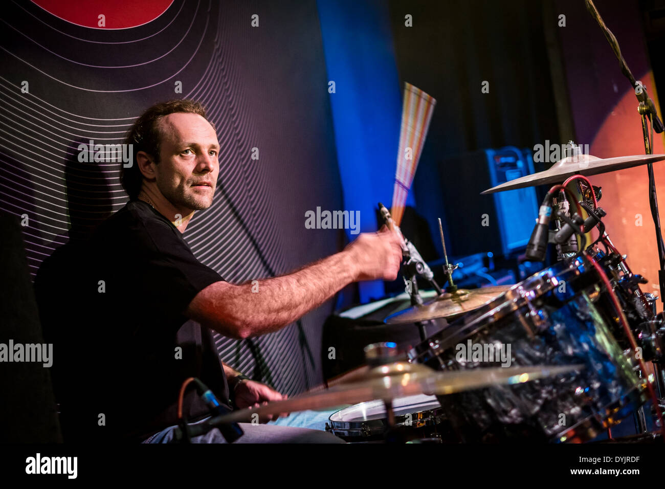 musician playing drums on stage, rock music concert Stock Photo - Alamy