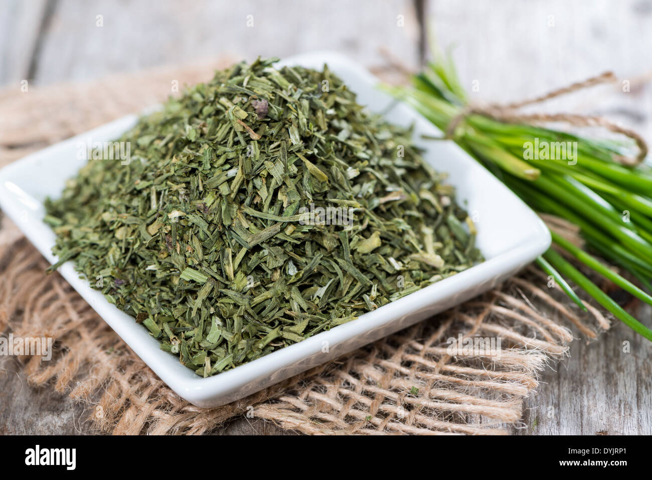 Dried Chive (shredded) as detailed studio shot Stock Photo - Alamy