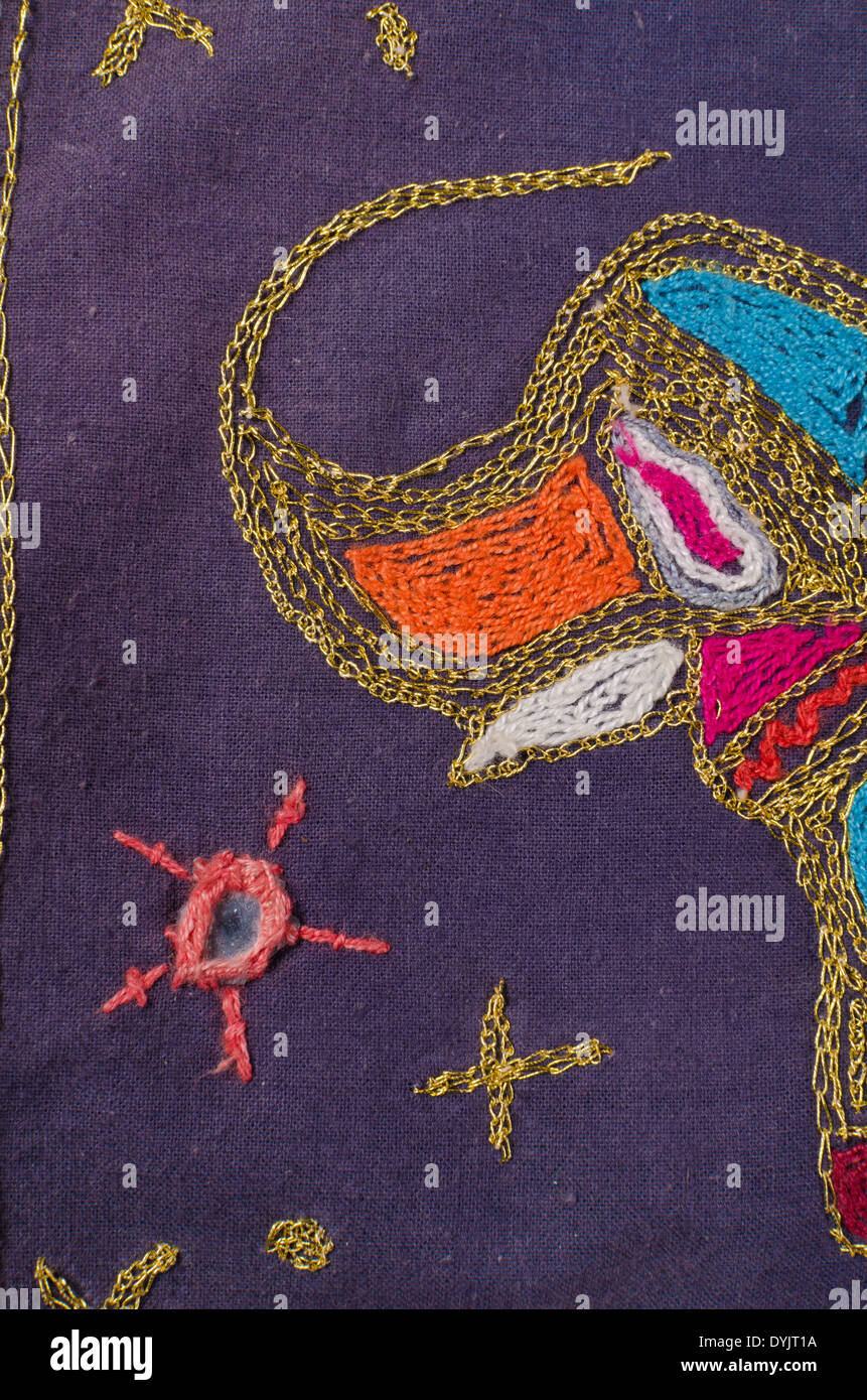 Handcrafted fabric with an embroidered elephant Stock Photo - Alamy