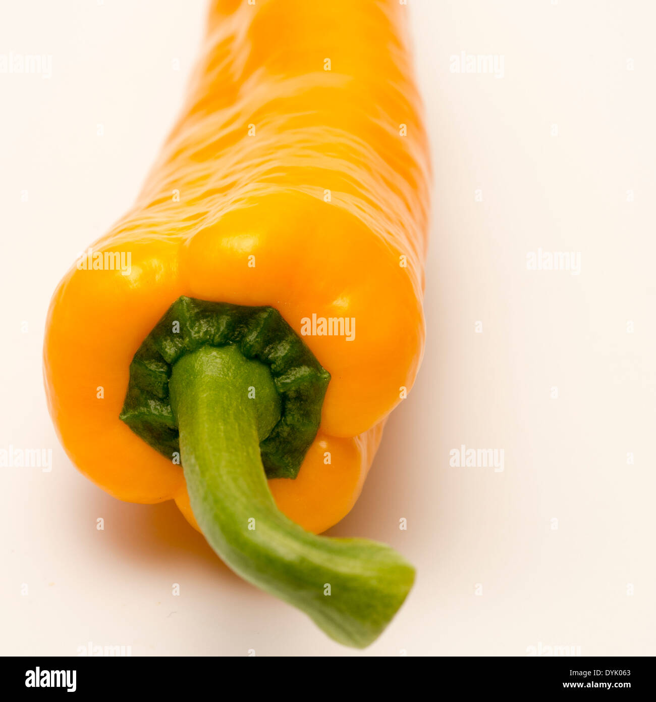 Single yellow pepper isolated on a white background Stock Photo - Alamy