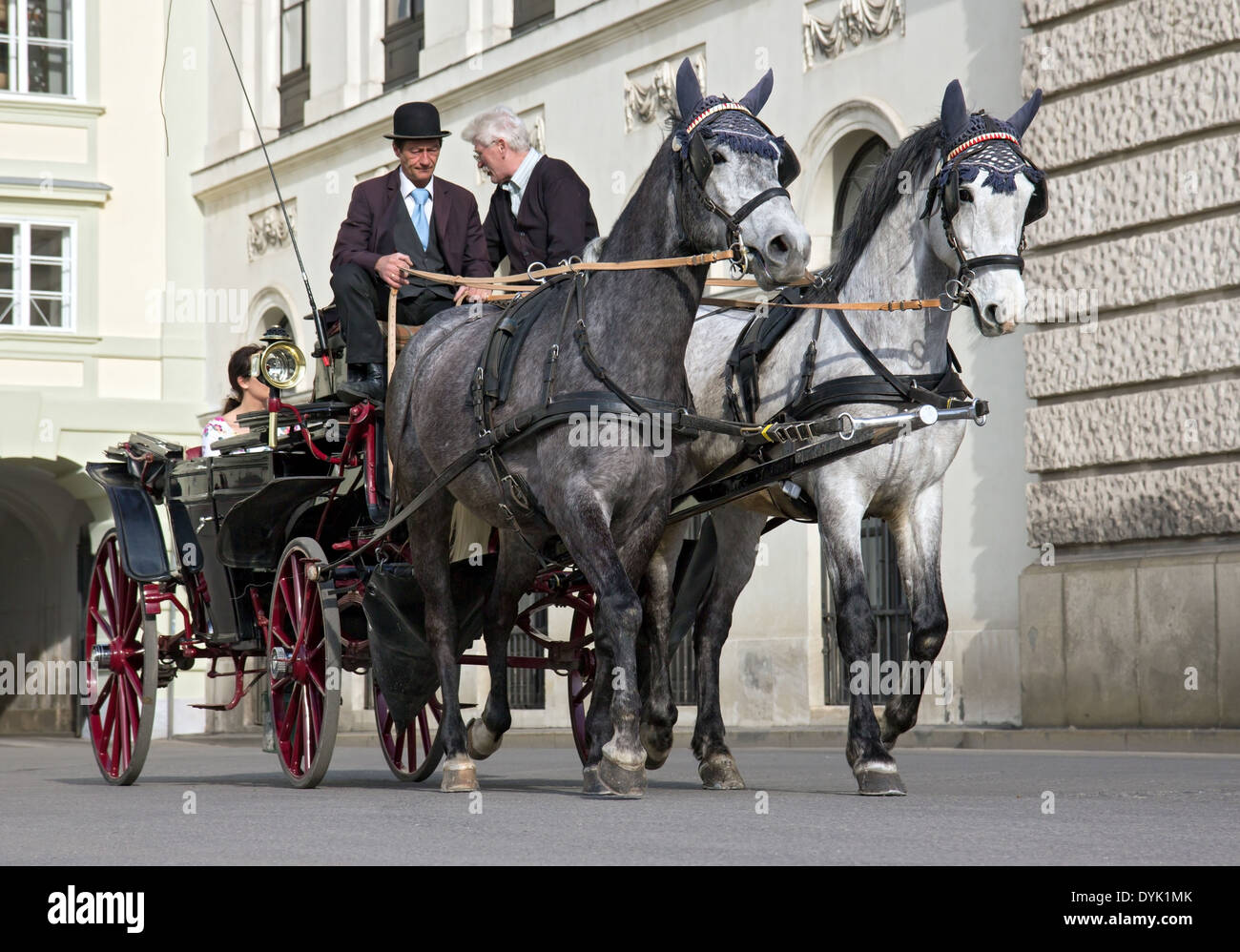Horse-driven carriage at Hofburg palace, Vienna, Austria Stock Photo ...