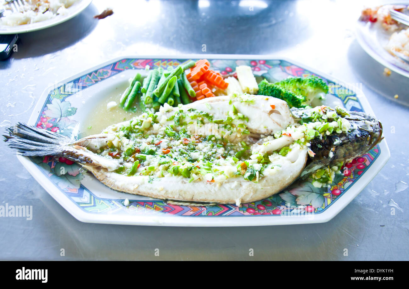 steam fish with herb for healthy food Stock Photo - Alamy