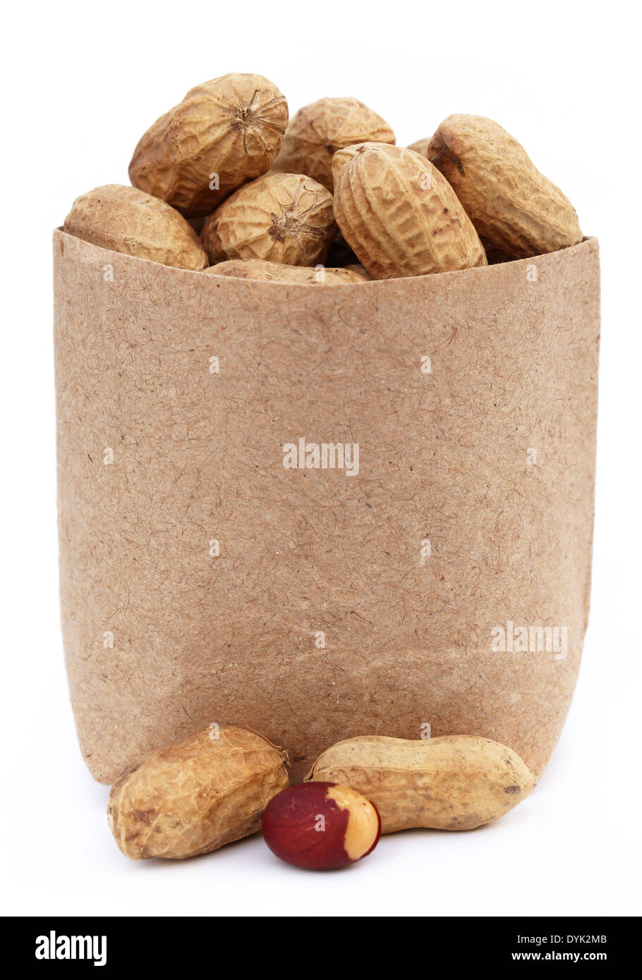 Peanut with a paper pack over white background Stock Photo - Alamy