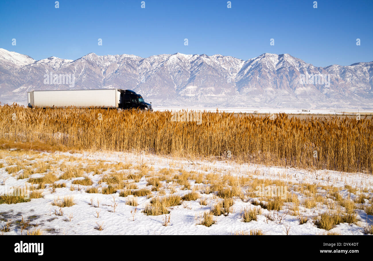 Snow Covered Mountains Behind Lakeside Highway PLant Growth Utah ...