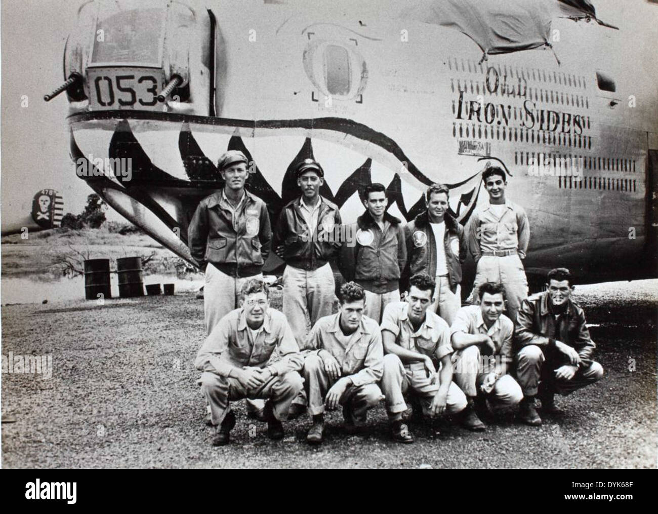 The photo features aircrews from the 90th Bomb Group, including ...