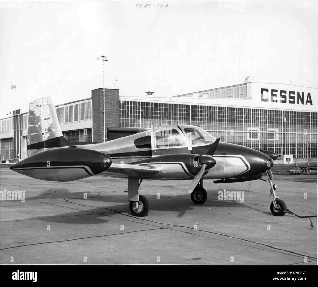 This image captures Mort Brown, a test pilot for Cessna, flying the ...