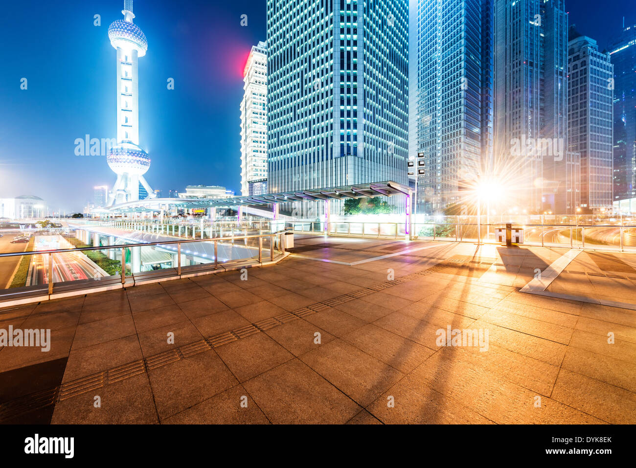 the light trails on the modern building background in shanghai china ...