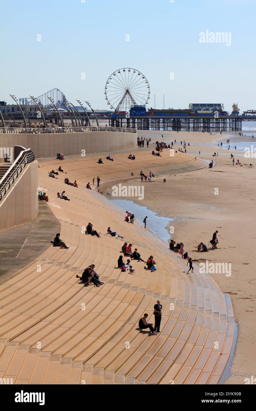 Tourist on the promenade and seafront regeneration with distant Central ...