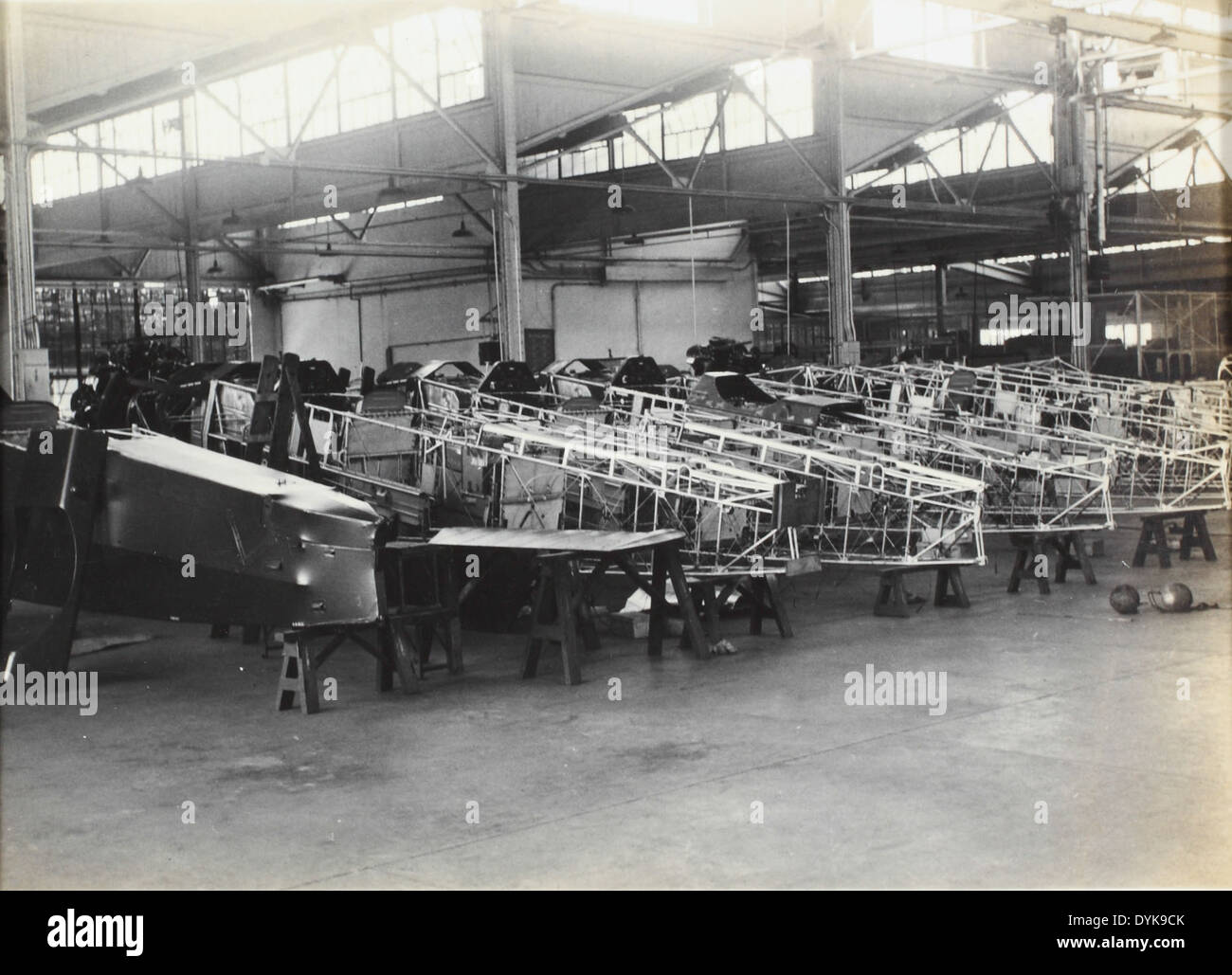 This image highlights the construction process of an aircraft, focusing ...