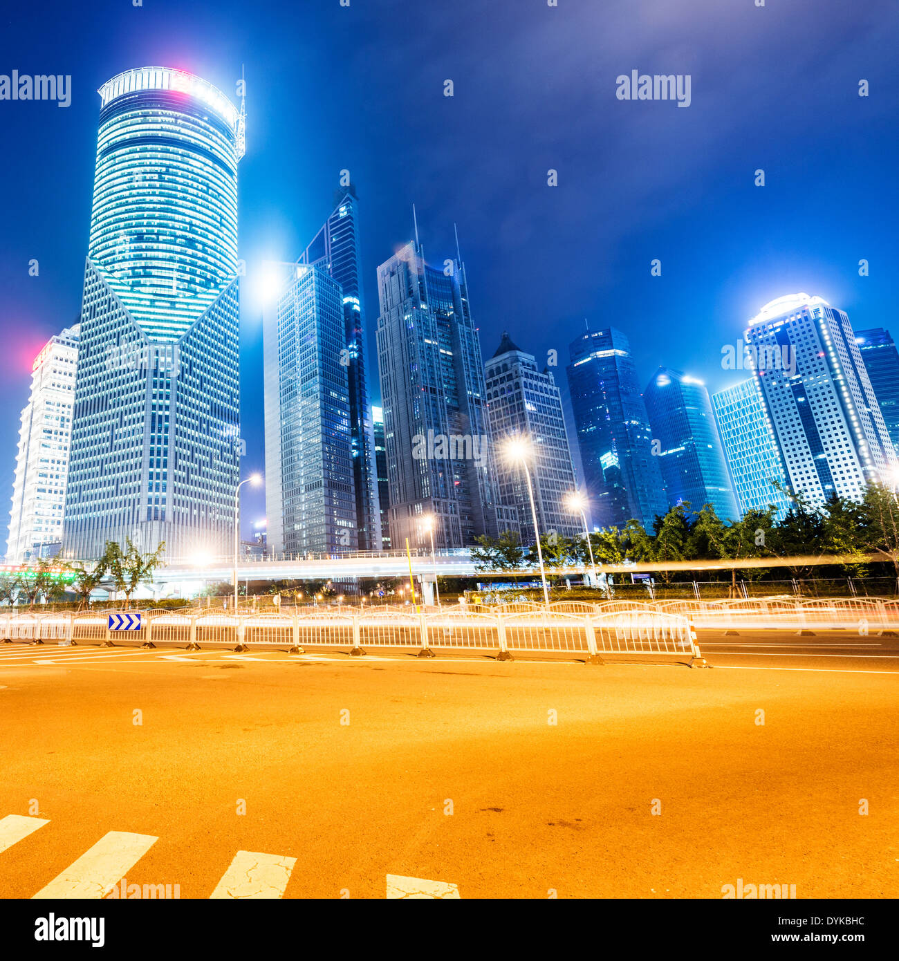 the light trails on the modern building background in shanghai china ...