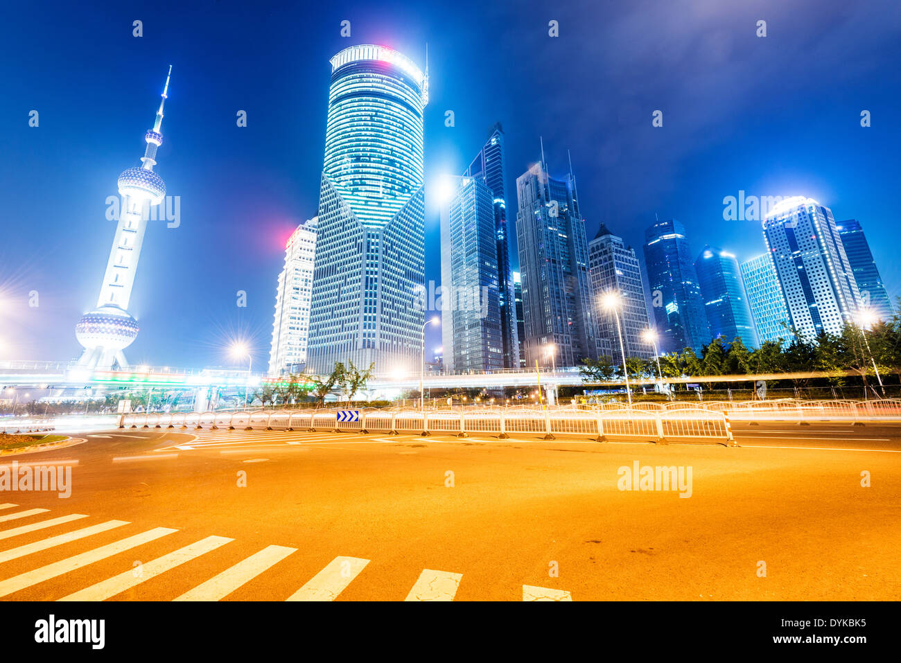 the light trails on the modern building background in shanghai china ...
