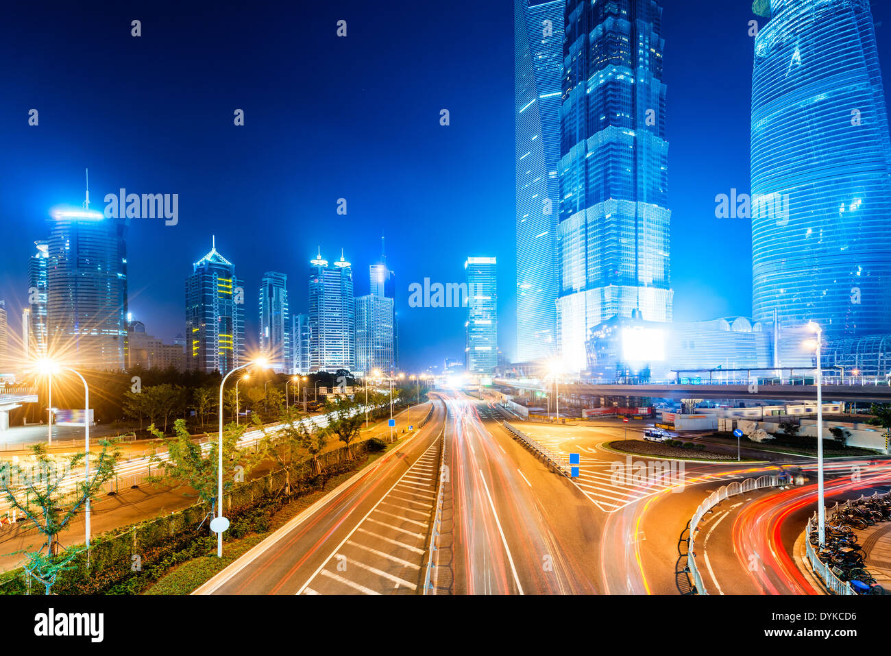 the light trails on the modern building background in shanghai china ...