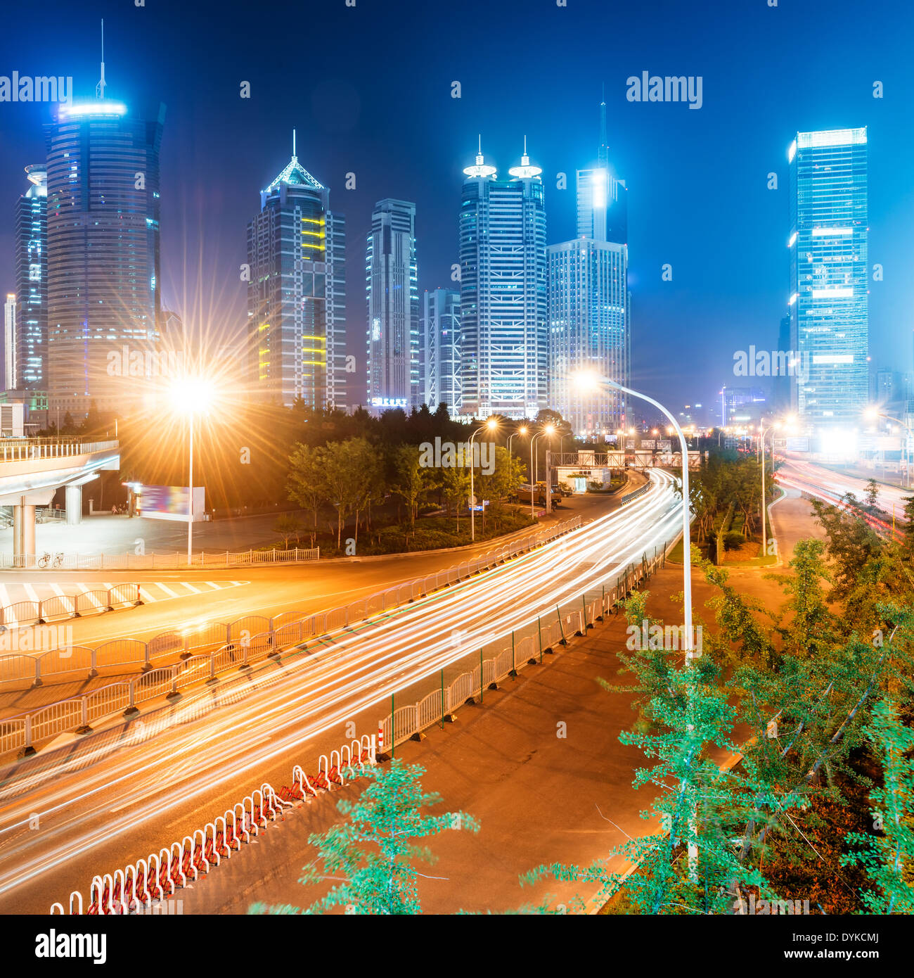 the light trails on the modern building background in shanghai china ...