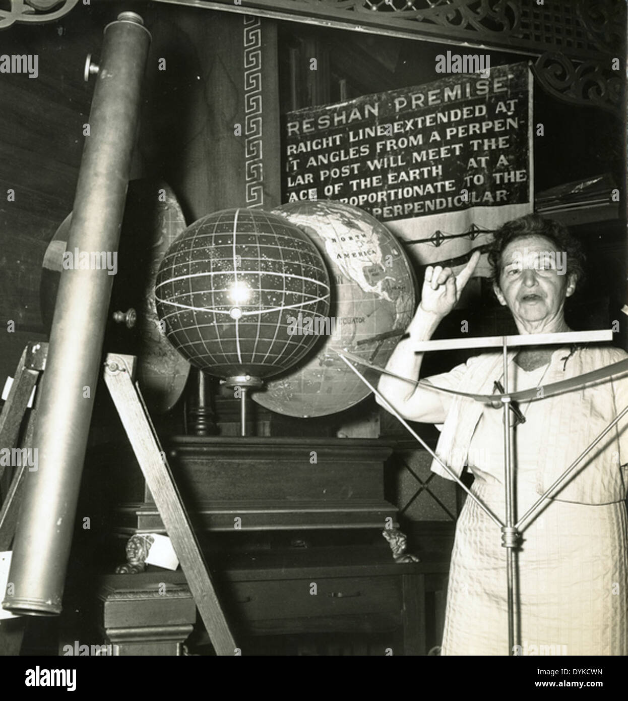 Koreshan Unity president Hedwig Michel is shown lecturing with a globe ...