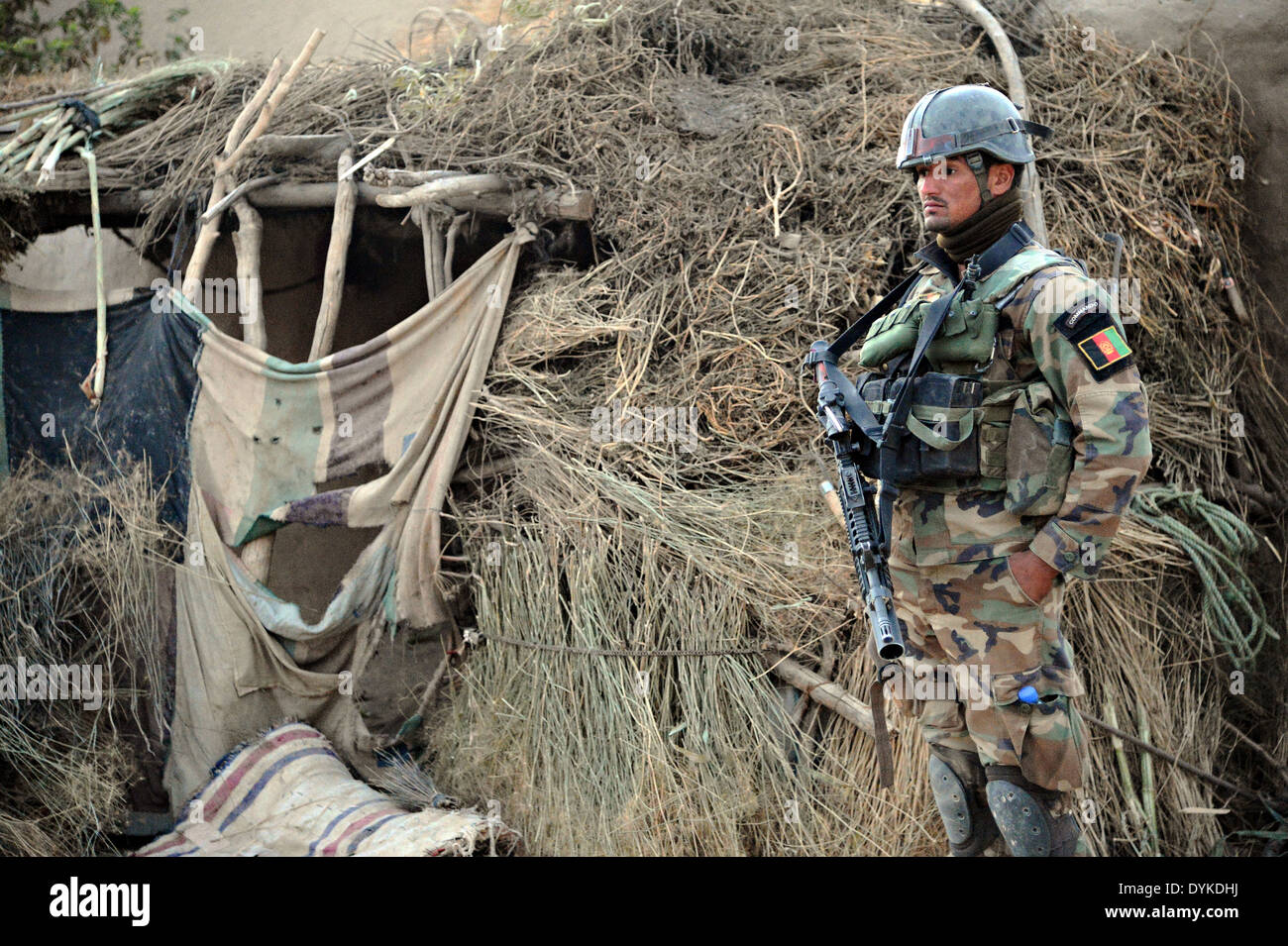 An Afghan Army commando from 3rd Special Operations Kandak provides ...