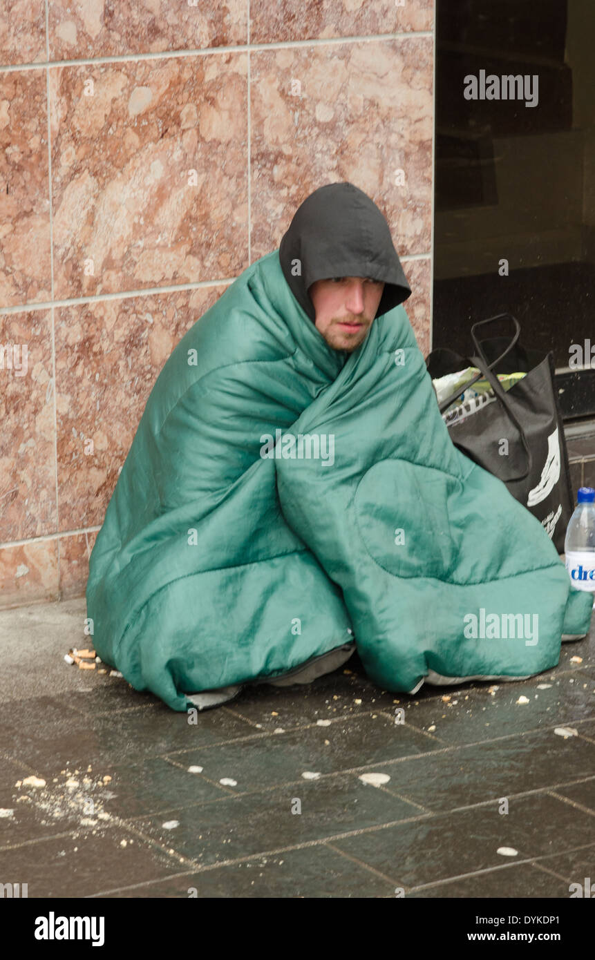 Homeless men begging on the streets of Newcastle upon Tyne Stock Photo ...