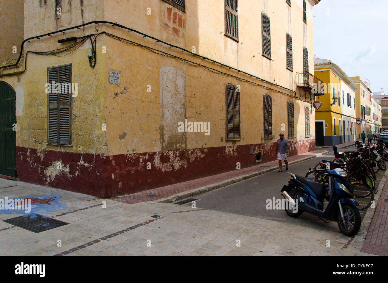 Old shuttered building on the streets of the Menorcan town of ...