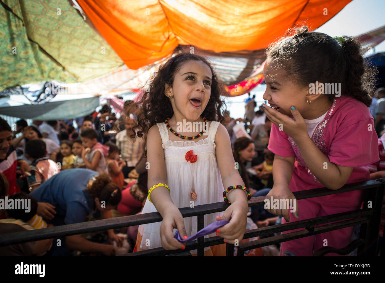 Cairo, Egypt. 21st Apr, 2014. Two Egyptian girls play during a ...