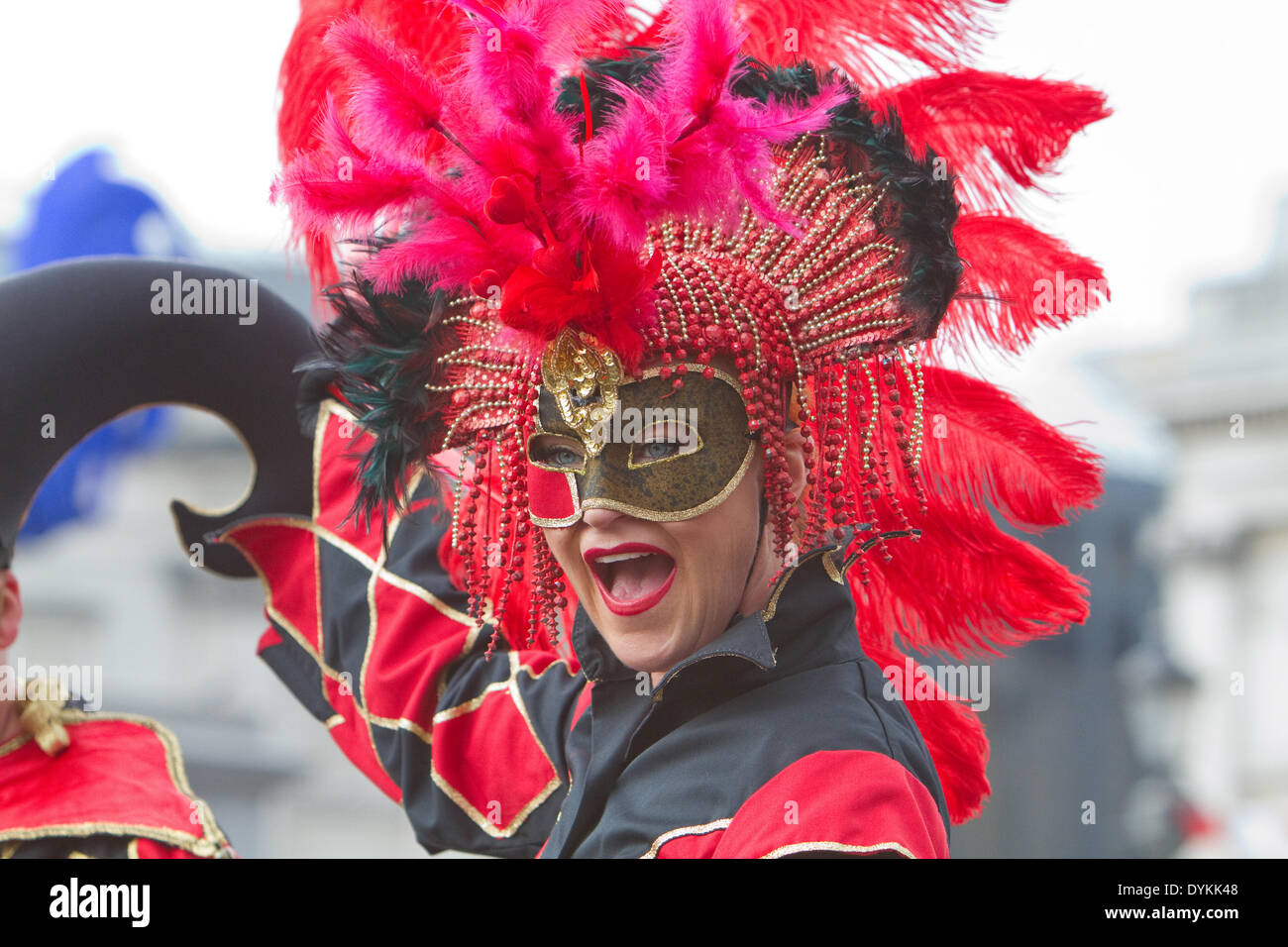 London,UK,21st April 2014,A female jester on stilits entertained crowds ...