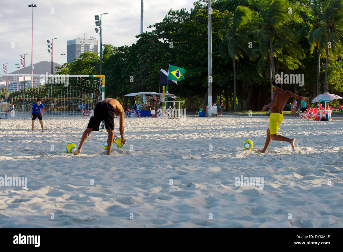 Kids playing beach football hi-res stock photography and images - Alamy