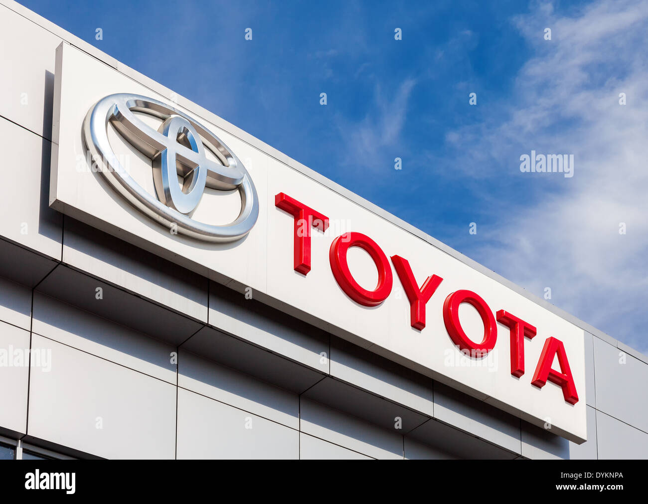The emblem Toyota on the office of official dealer Stock Photo - Alamy