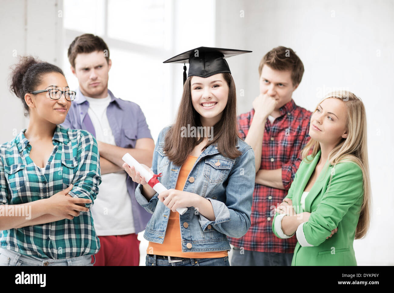girl in graduation cap with certificate Stock Photo - Alamy