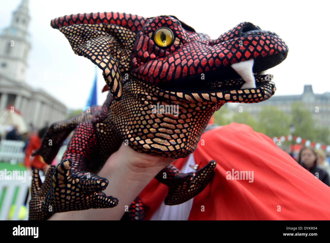 London, UK. 21st April, 2014. A hand puppet Dragon at the Feast of St ...