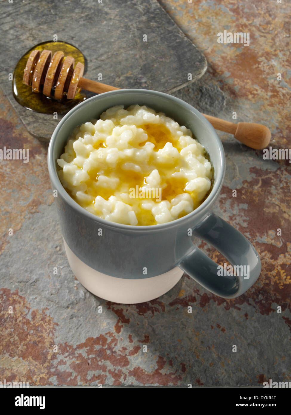 Individual honey drizzled rice pudding hi-res stock photography and ...