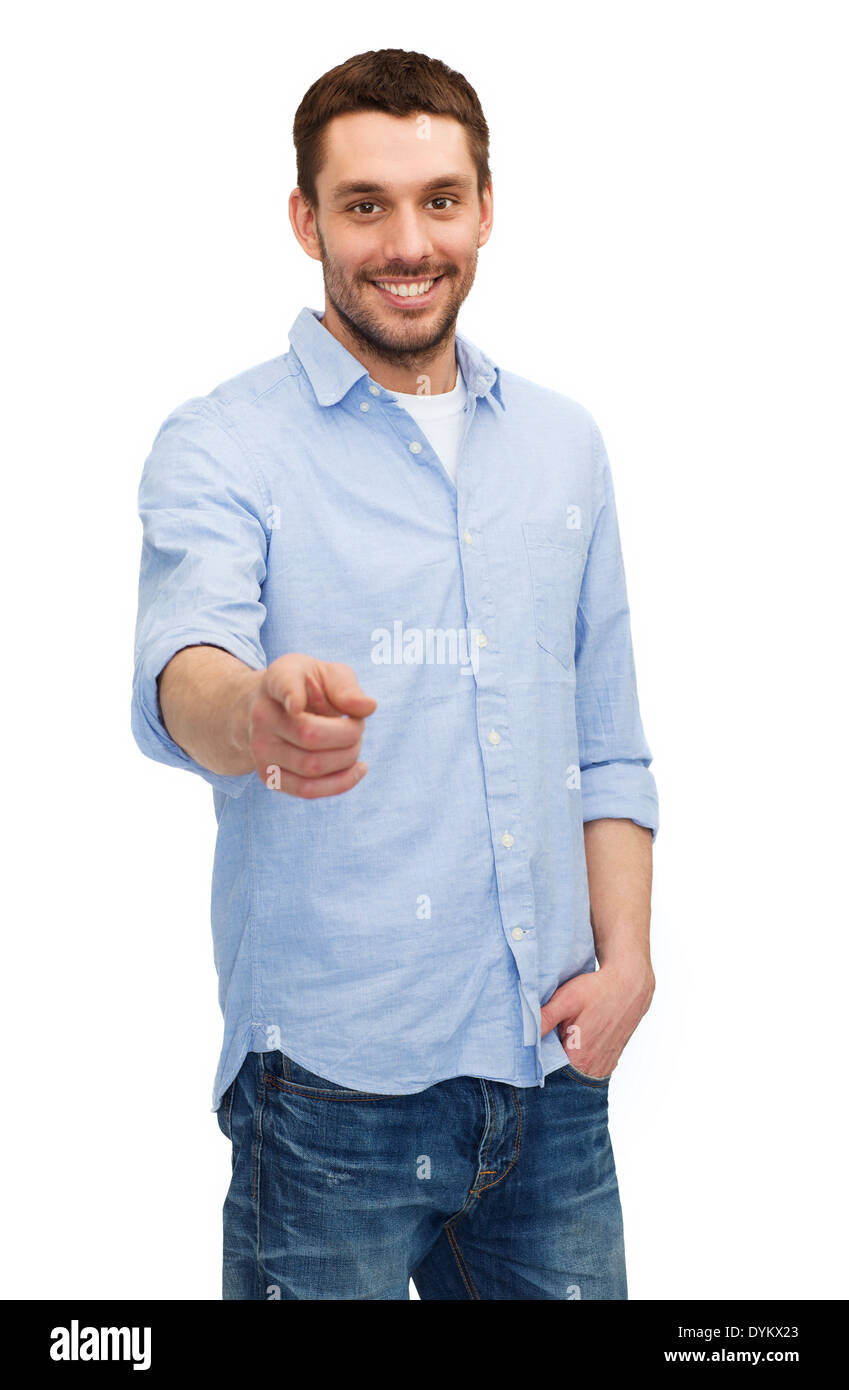smiling man pointing finger at you Stock Photo - Alamy