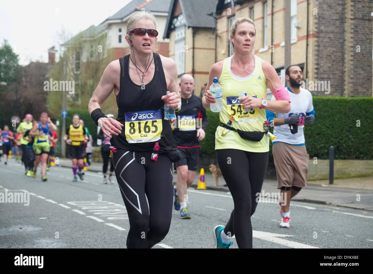 Runners reach the approximate half-way stage along Market Street ...