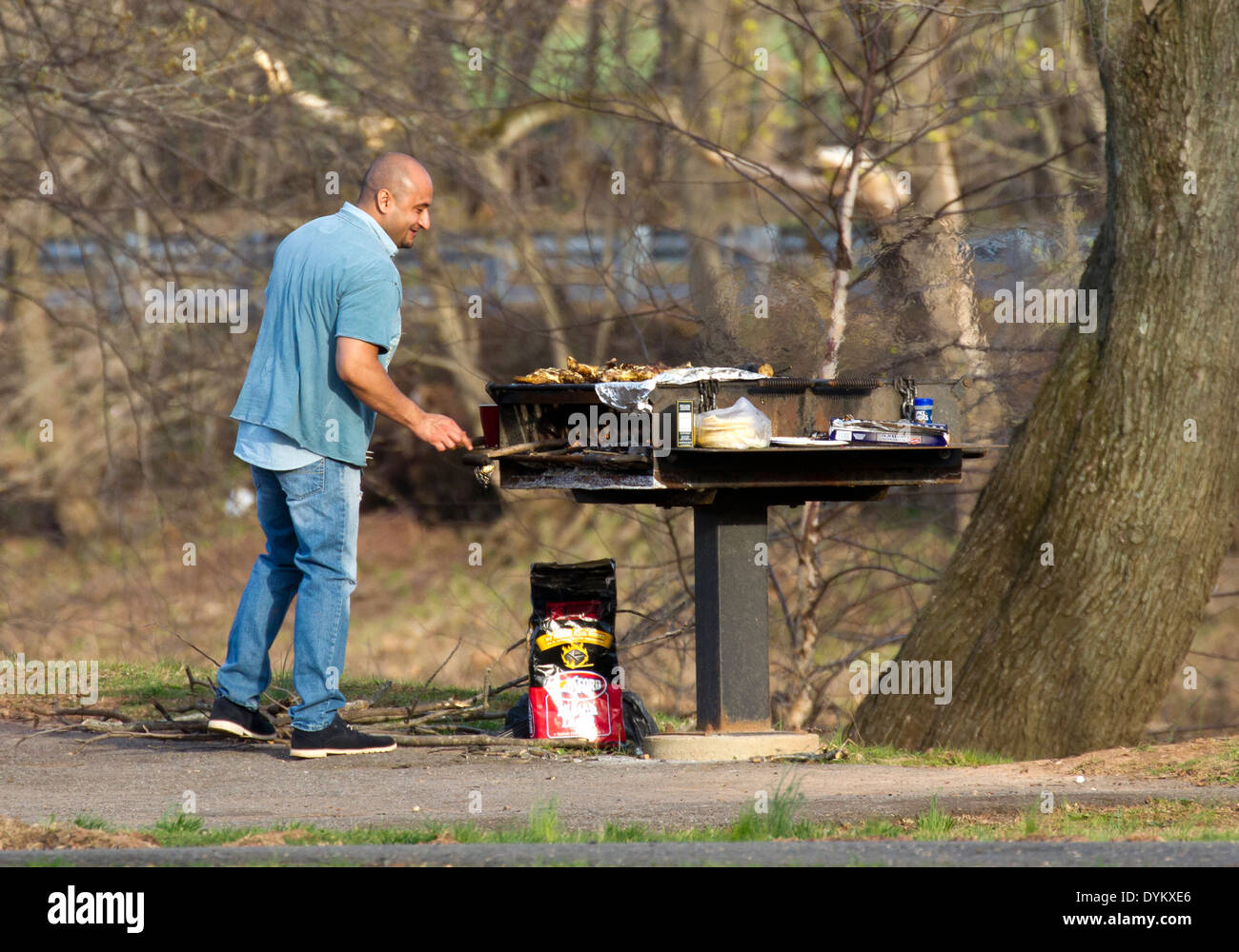 Man is cooking hi-res stock photography and images - Alamy