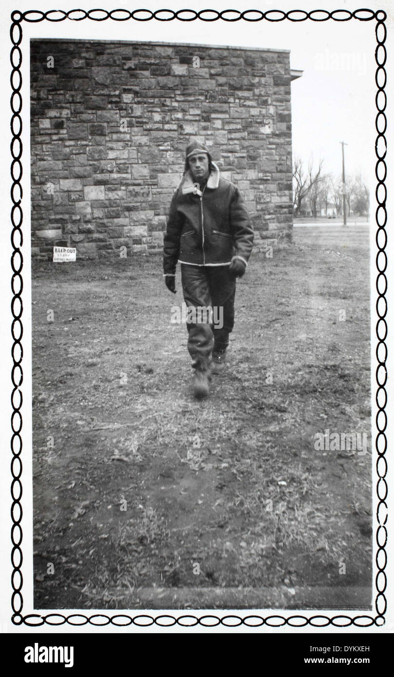 This photo shows a pilot walking in preparation for a flight. Pilots ...