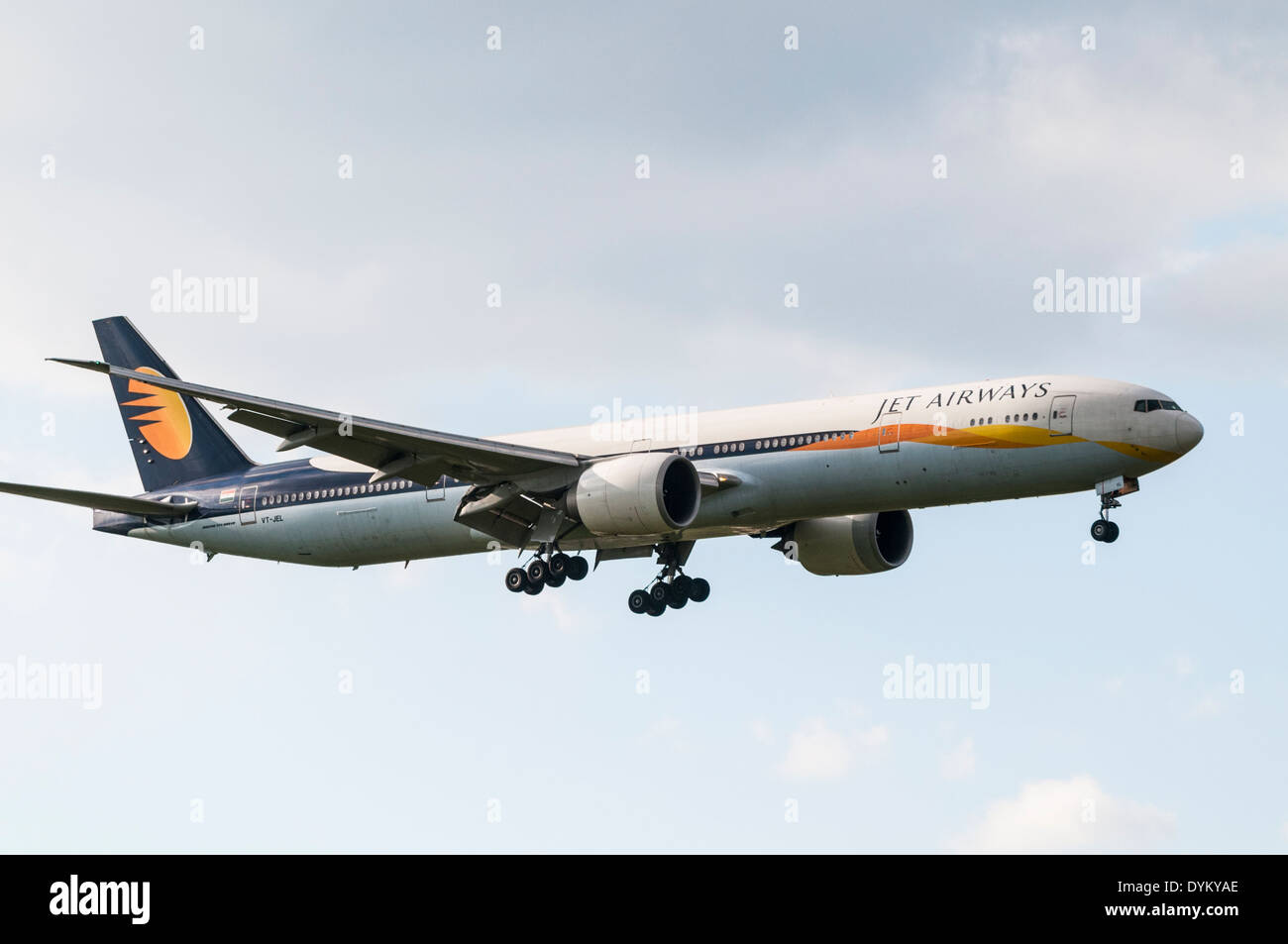 Side view of a Jet Airways Boeing 777 plane on approach to land with ...